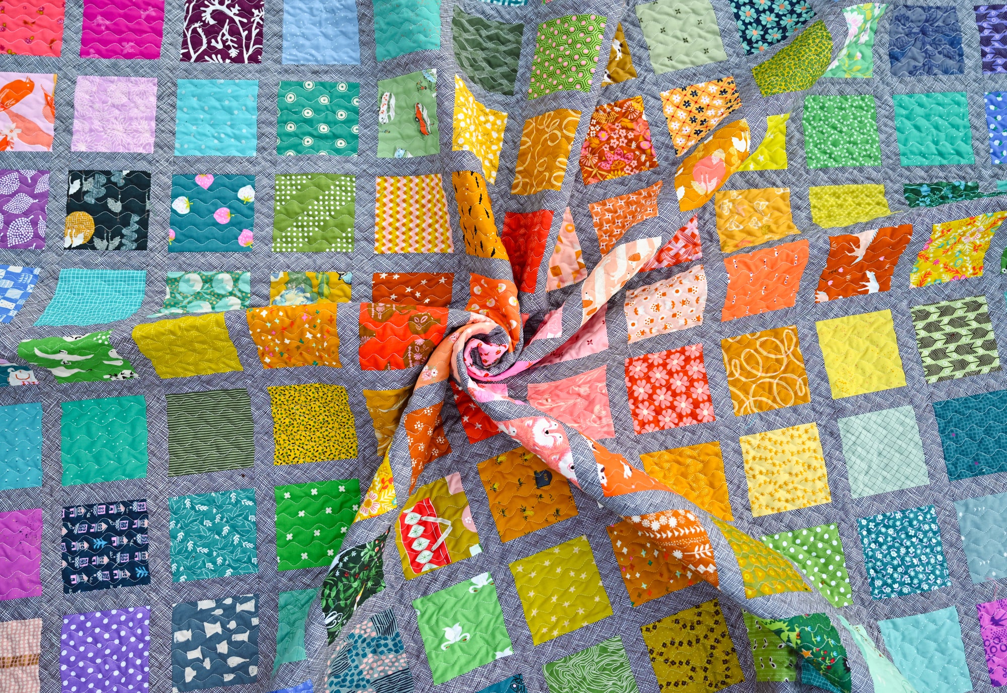 A Scrappy Rainbow Fiona Quilt – Kitchen Table Quilting